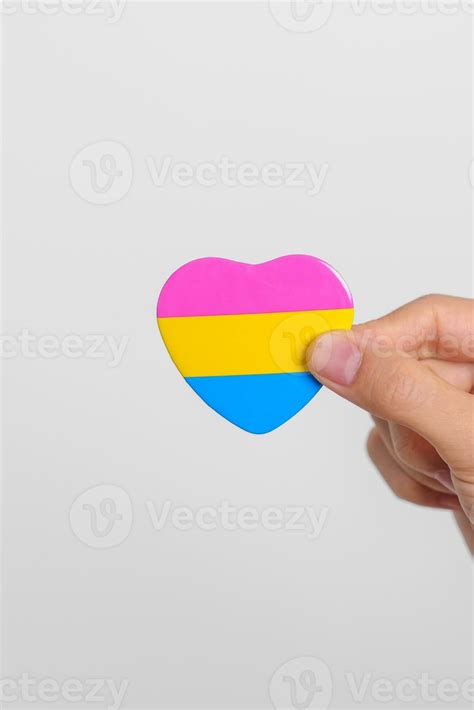 Pansexual Pride Day And Lgbt Pride Month Concept Hand Holding Pink Yellow And Blue Heart Shape