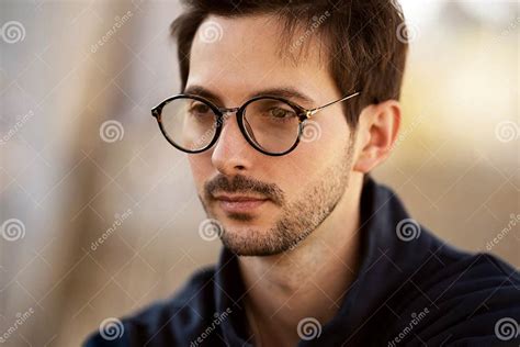 Portrait Of A Guy With Glasses Posing Outdoors Stock Image Image Of