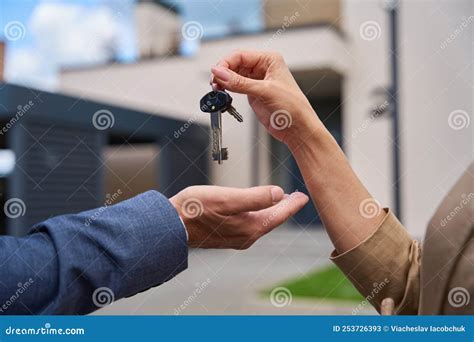 Close Up Of Woman Hand Passing Keys To Man Hand Stock Image Image Of