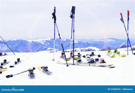 Skiing Winter Season Mountains And Ski Equipments On Ski Run