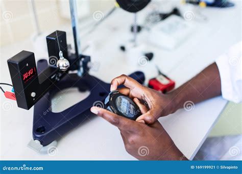 Scientist With Laboratory Clock And Timer Stock Image Image Of Clock Analytic 169199921