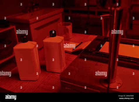 Essential Darkroom Chemical Bottles Poised For Use In The Analog Film