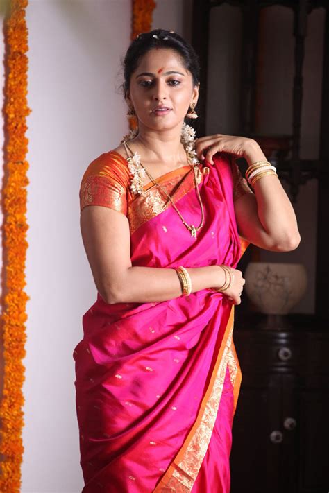 Indian Girl Anushka Shetty Long Hair Photos In Red Traditional Saree