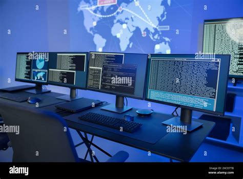 Cyber Security Command Center With Multiple Monitors Displaying Data Analysis And Network