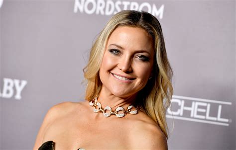 Kate Hudson Makes Office Fashion Sexy In A Sheer Turtleneck And Wide