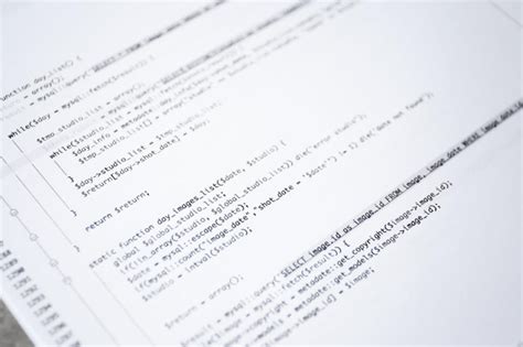 Premium Photo Script Code Printed On Paper Closeup