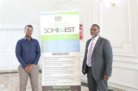 With Dr Abdinur Ali Simad University Dean—faculty Of Economics