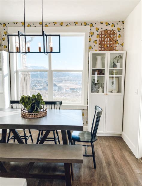 Dining Room With Lemon Wallpaper And Billy Bookcases Nesting With Grace