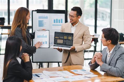 Professional Diverse Business Team Presenting And Discussing Data