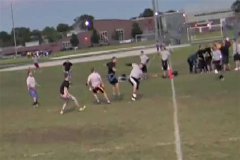 Quarterback Throws 30 Yard Behind The Back Touchdown Pass