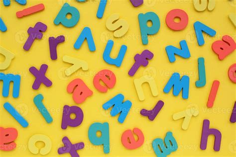 Pile Of Jumbled Messy Letters Pattern On Yellow Background Latin