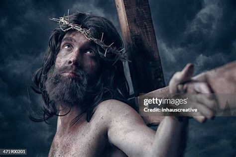 Jesus Christ Nailed To The Cross Photos And Premium High Res Pictures