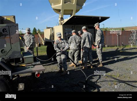 North Carolina National Guard Army Spc Megan Blue Middle Pulls The