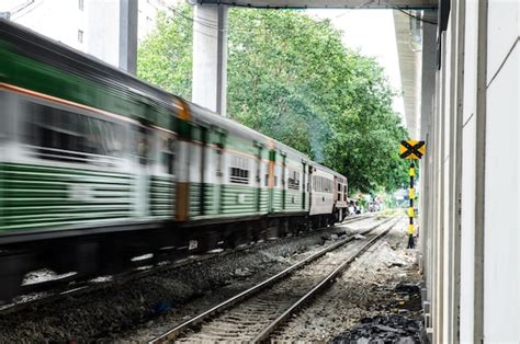 Premium Photo Train Passing Through Railroad Station Platform