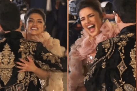 Priyanka Chopra Karan Johar Laugh Hug And Chat At The Nmacc Launch Event Amid Tiff Rumours