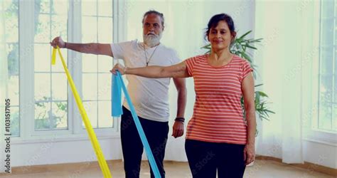 Happy Indian Asian Mid Aged Fitness Enthusiast Couple In Their Fifties