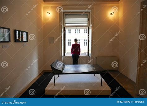 Girl Standing With Her Back At Window At Psychoanalysis Couch In Sigmund Freud Museum In Vienna