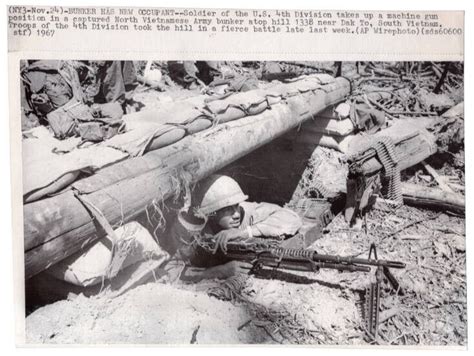 M 60 Vietnam Us Army M60 Machine Gunner In Front Of A Burning Hut