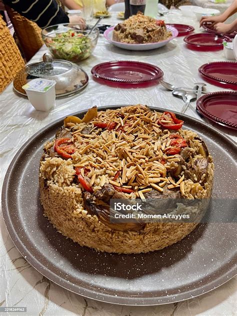 Traditional Palestinian Maqluba With Layers Of Rice Vegetables Beef And