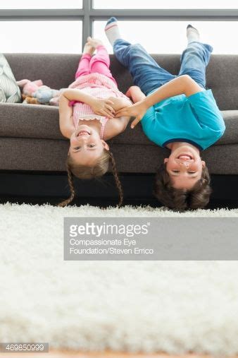 Brother And Sister Hanging Upside Down On Sofa Hanging Upside Down Creative Video Sport Event