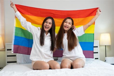 Premium Photo Portraits Of Happy Asian Lesbian Couple Sitting With