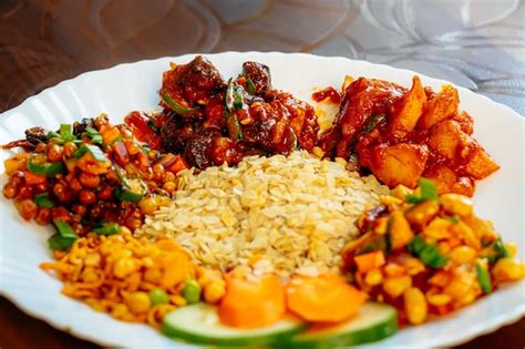 Premium Photo Nepali Newari Khaja Set With Meat Beatean Rice Vegetables And Snacks