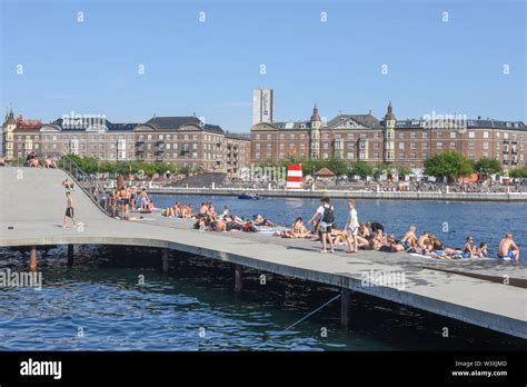 Copenhagen Denmark 25 June 2019 People Sunbathing In The Center Of