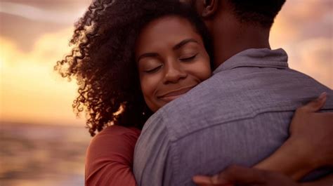 A Loving Embrace At Sunset Premium Ai Generated Image