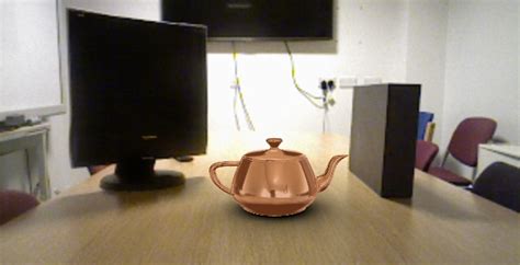 Image Augmented With Virtual Reflective Teapot Rendered Using The