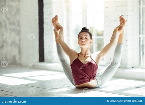 Flexible Girl Doing Yoga Posture In A Gym Stock Image Image Of