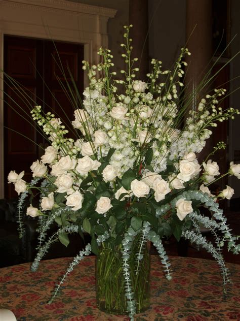 Glass Cylinder Vase With Roses Delphiniums And Eucalyptus