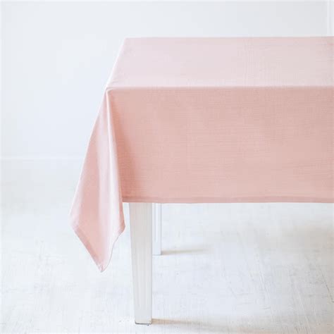 Premium Photo Light Pink Decorative Tablecloth On A Table On A White