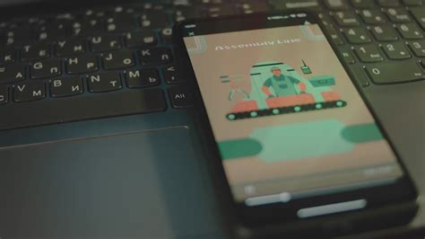 Assembly Line Efficiency Inscription On Smartphone Screen Graphic