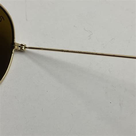 عینک ریبن خلبانی قهوه ای شیشه سنگ با پک کامل اورجینال سایز 3024 کالندز