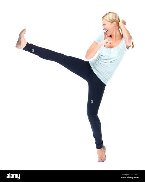 Woman Fight And Kick A Leg In Air With Karate Action Or Movement On