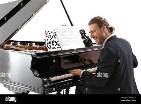 Man Playing Grand Piano