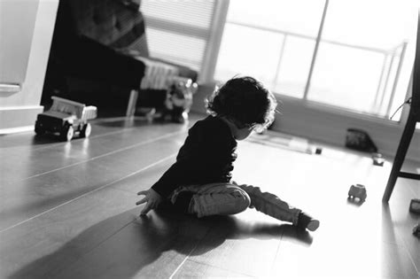Boy On Floor Premium Photo