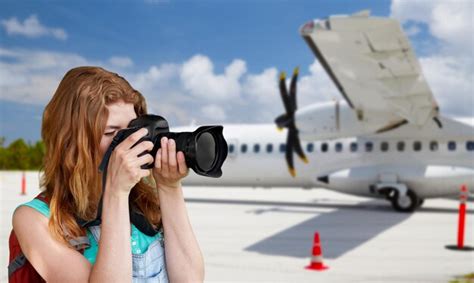 Premium Photo Tourist Woman Photographing By Camera Over Plane