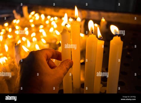 Lighting A Candle For Someone In The Catholic Church At Jean Begaye Blog