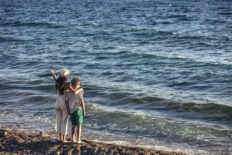 Brother And Sister On The Beach Having Fun Stock Image Image Of
