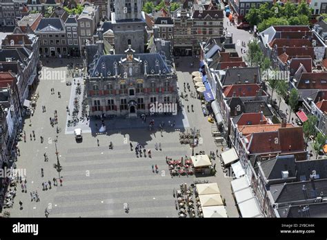 A View Of The Market Square In Delft With The City Hall In The Centre