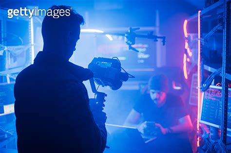 The Process Of Filming Cameraman Shoots A Scene With A Hacker 이미지 1132300712 게티이미지뱅크