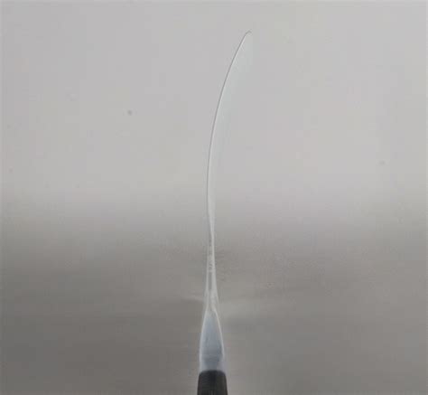 Left Caleb Heil White Catalyst 9x3 Stick Pro Stock Hockey