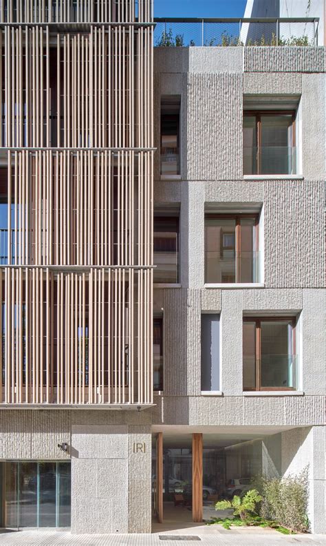 Wood Screens And Green Courtyards Define Apartment Block In Mallorca By Ohlab