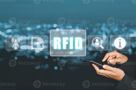 RFID Radio Frequency Identification Concept Person Using Laptop Computer And Hand Touching