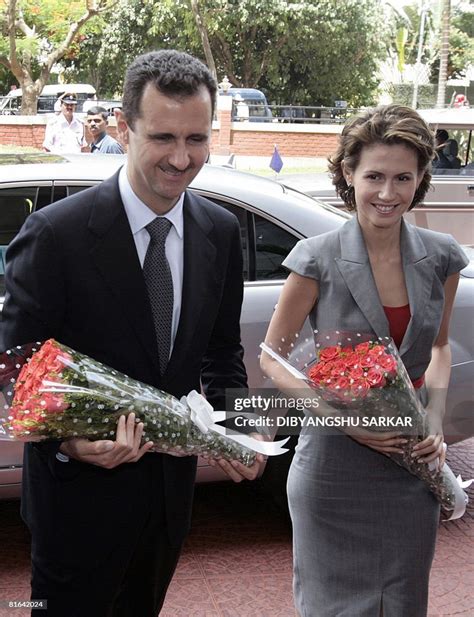 Syrian President Bashar Al Assad Is Accompanied By His Wife Asma As