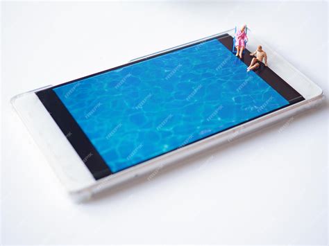 Premium Photo Miniature People Relax At Swimming Pool