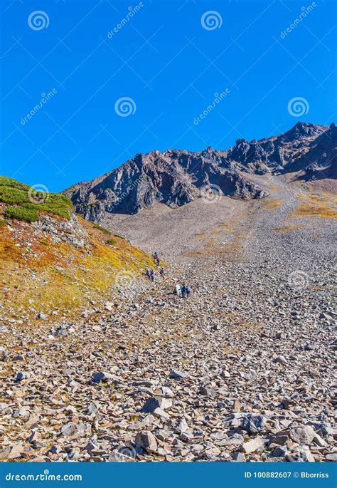 Stone Slope Of The Volcano With Walking Tourists Stock Image Image Of Natural Panorama