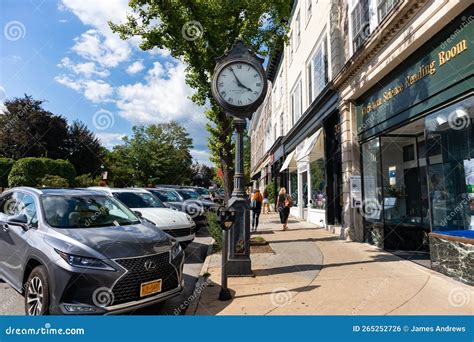 Stores And Clock Along Greenwich Avenue In Downtown Greenwich