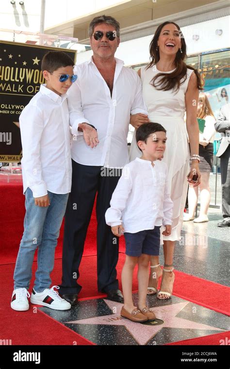 Los Angeles Aug 22 Adam Silverman Simon Cowell Eric Cowell Lauren